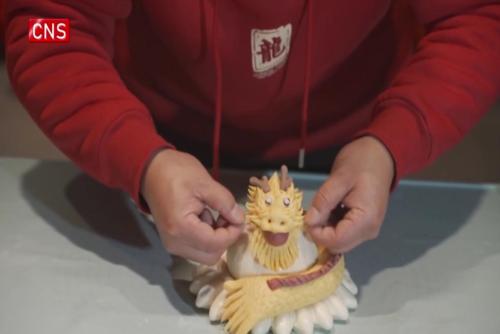 Craftsman in E China makes lifelike dragon-shaped steamed buns